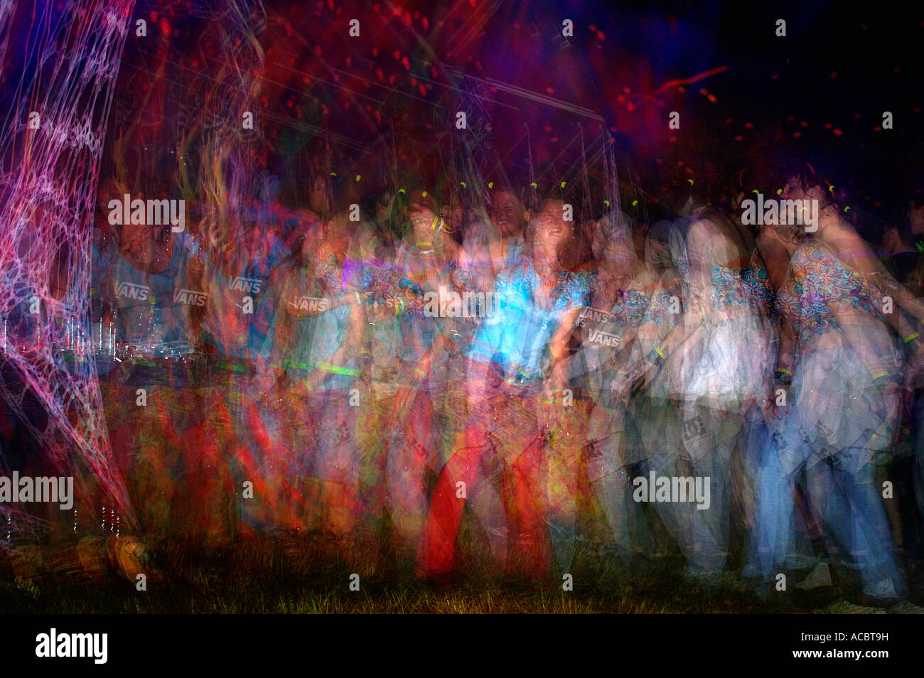 Teenagers dancing at night at at Hilltop Festival rave party Stock ...