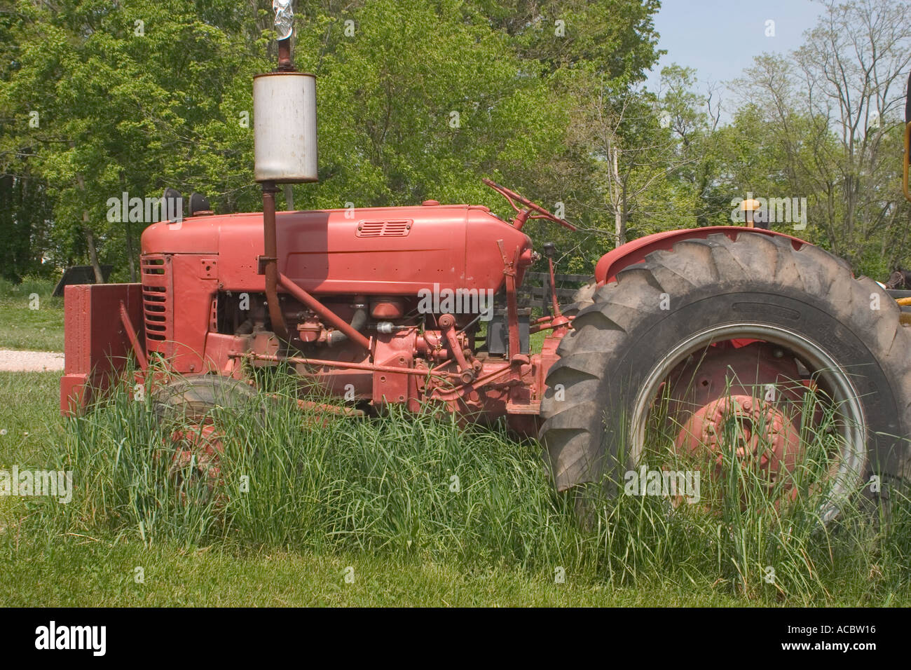 Old red tractor Stock Photo - Alamy