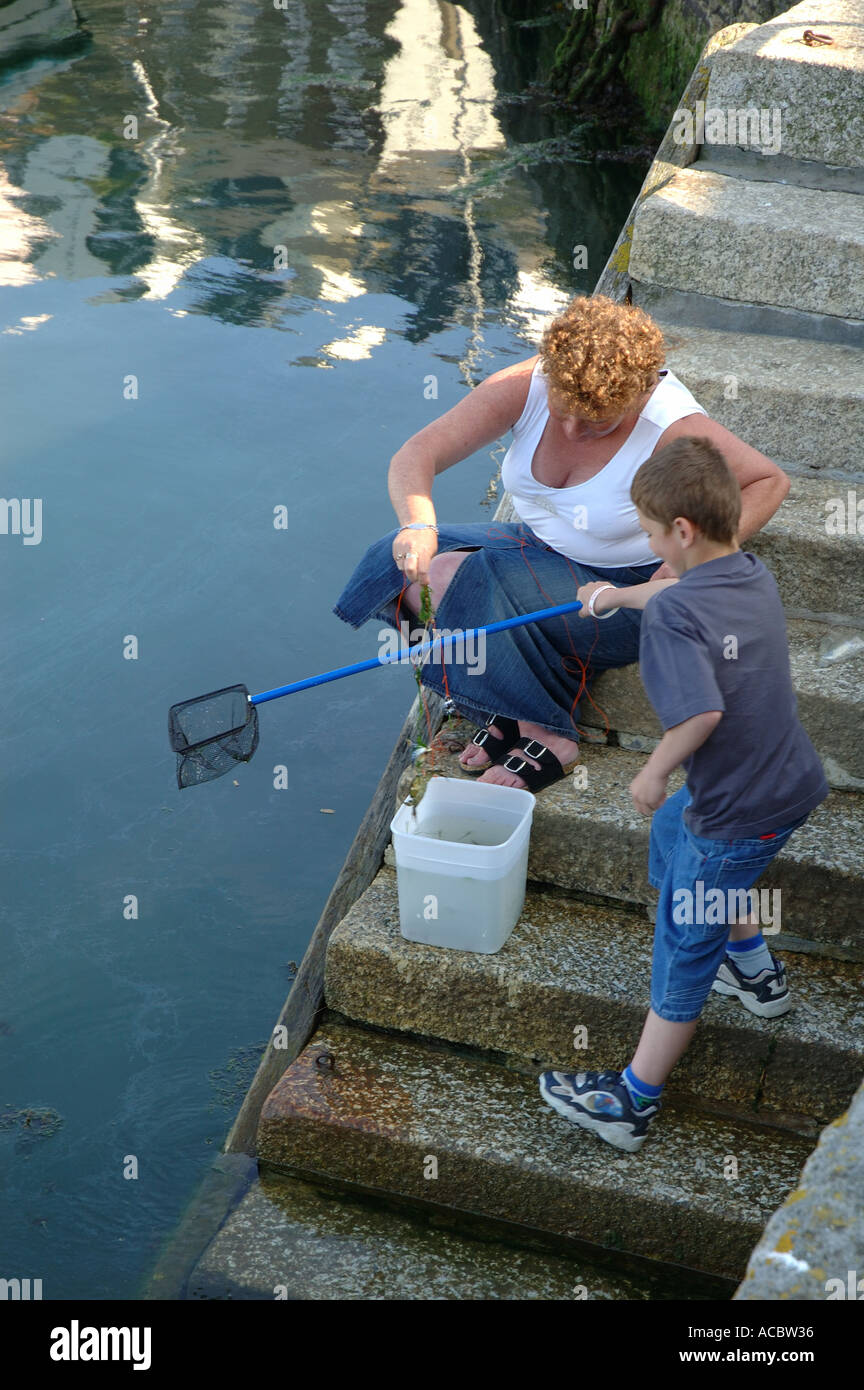 Boy fishing crabbing gillying hi-res stock photography and images - Alamy