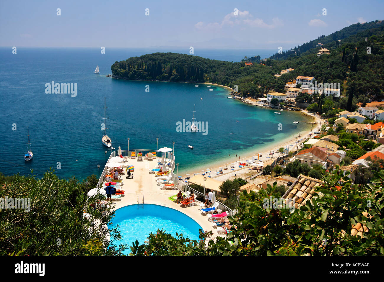 Corfu Island Kalami Hotel Pool beach overview Stock Photo - Alamy