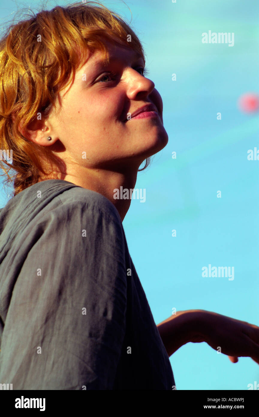 Happy teenage red head girl dancing at rave party Hilltop 2007 Stock ...