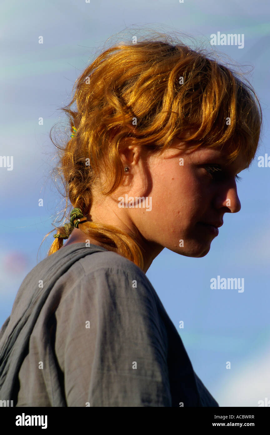 Happy teenage red head girl dancing at rave party Hilltop 2007 Stock ...