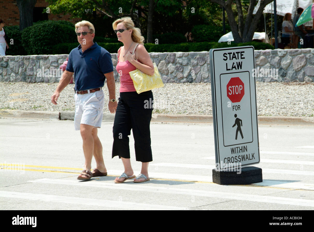 Stop sign in middle of street allowing pedestrians right of way when ...