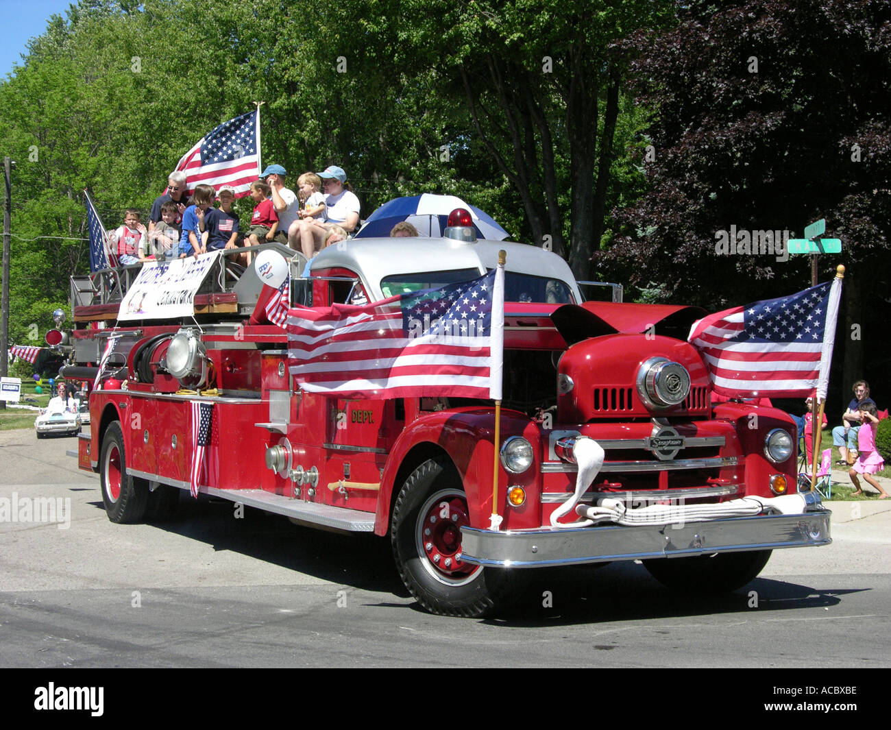 Current and vintage historic fire trucks at Independence Day parade at ...