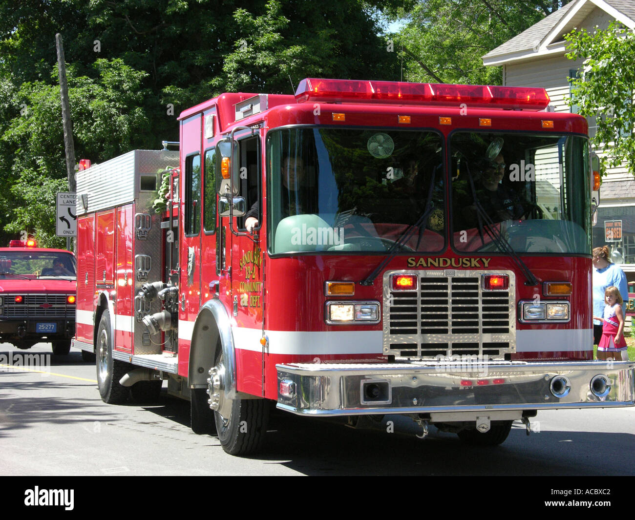 Current and vintage historic fire trucks at Independence Day parade at ...