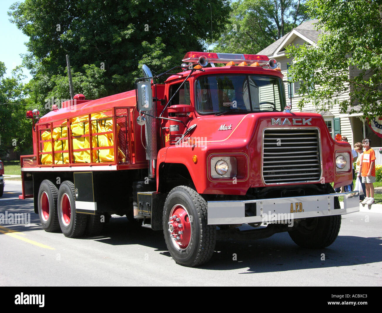 Current and vintage historic fire trucks at Independence Day parade at ...