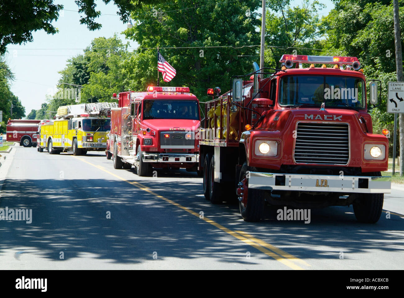 Current and vintage historic fire trucks at Independence Day parade at ...