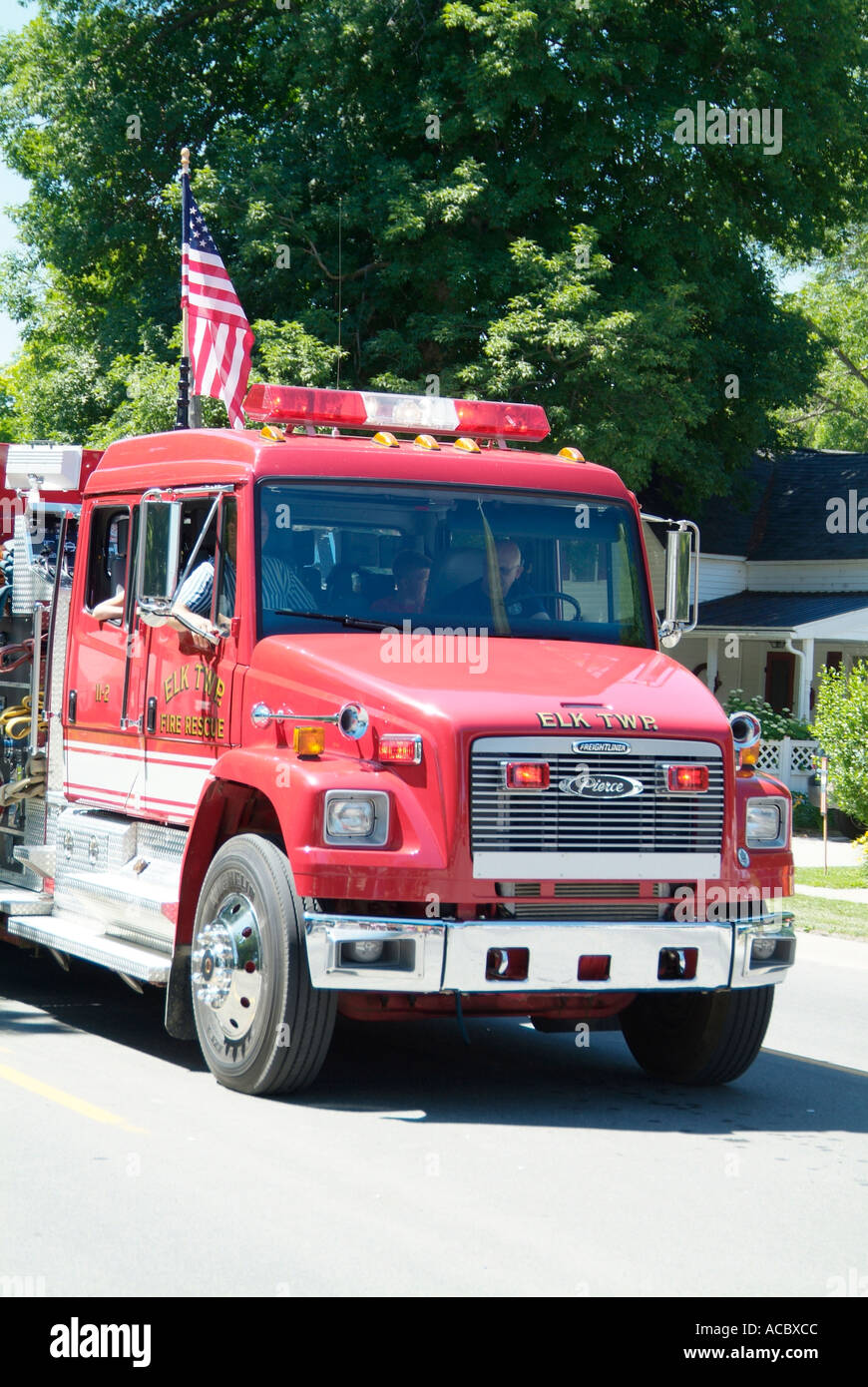Current and vintage historic fire trucks at Independence Day parade at ...