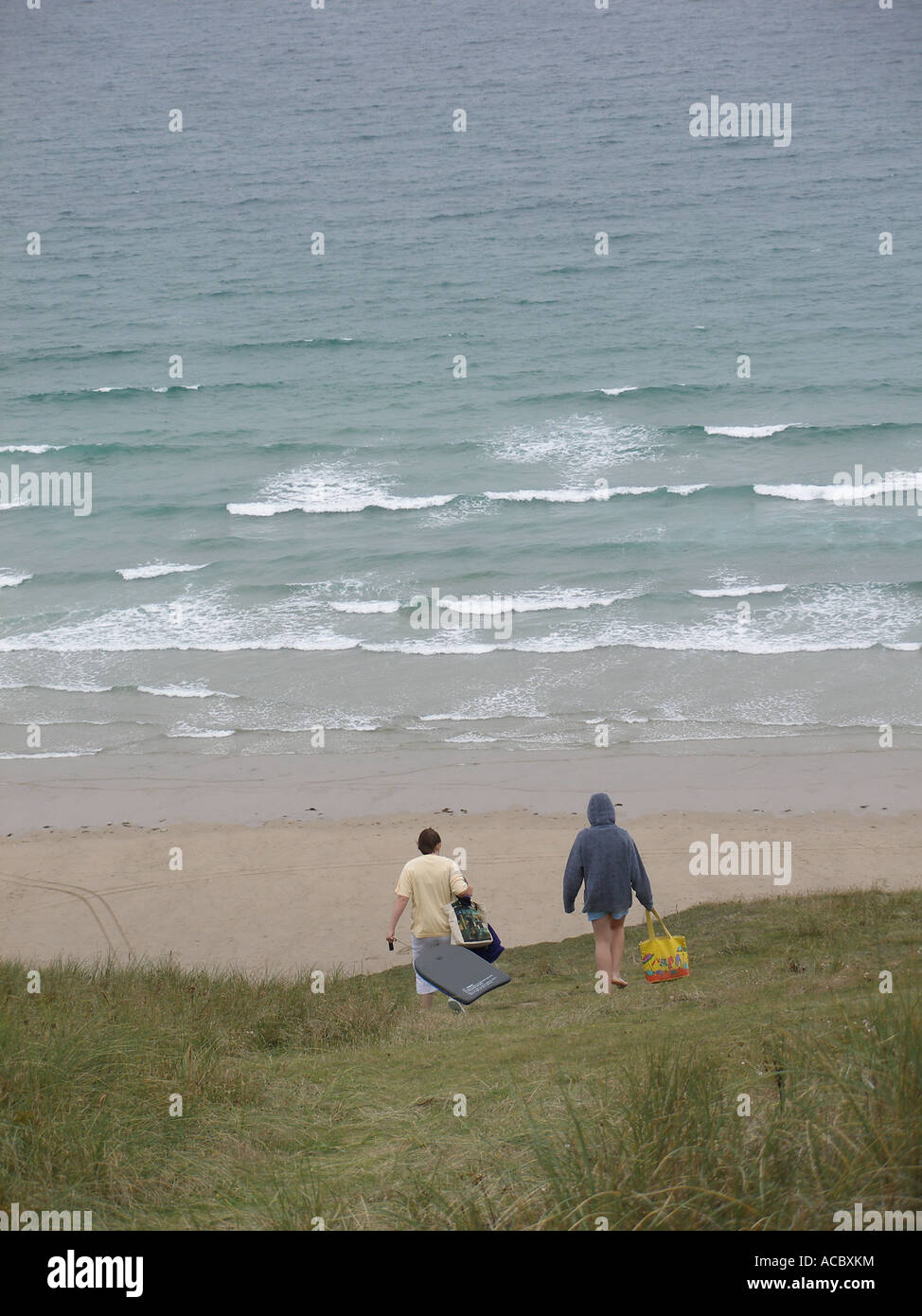 British summer at the beach in Cornwall, walking to the sea Stock Photo ...