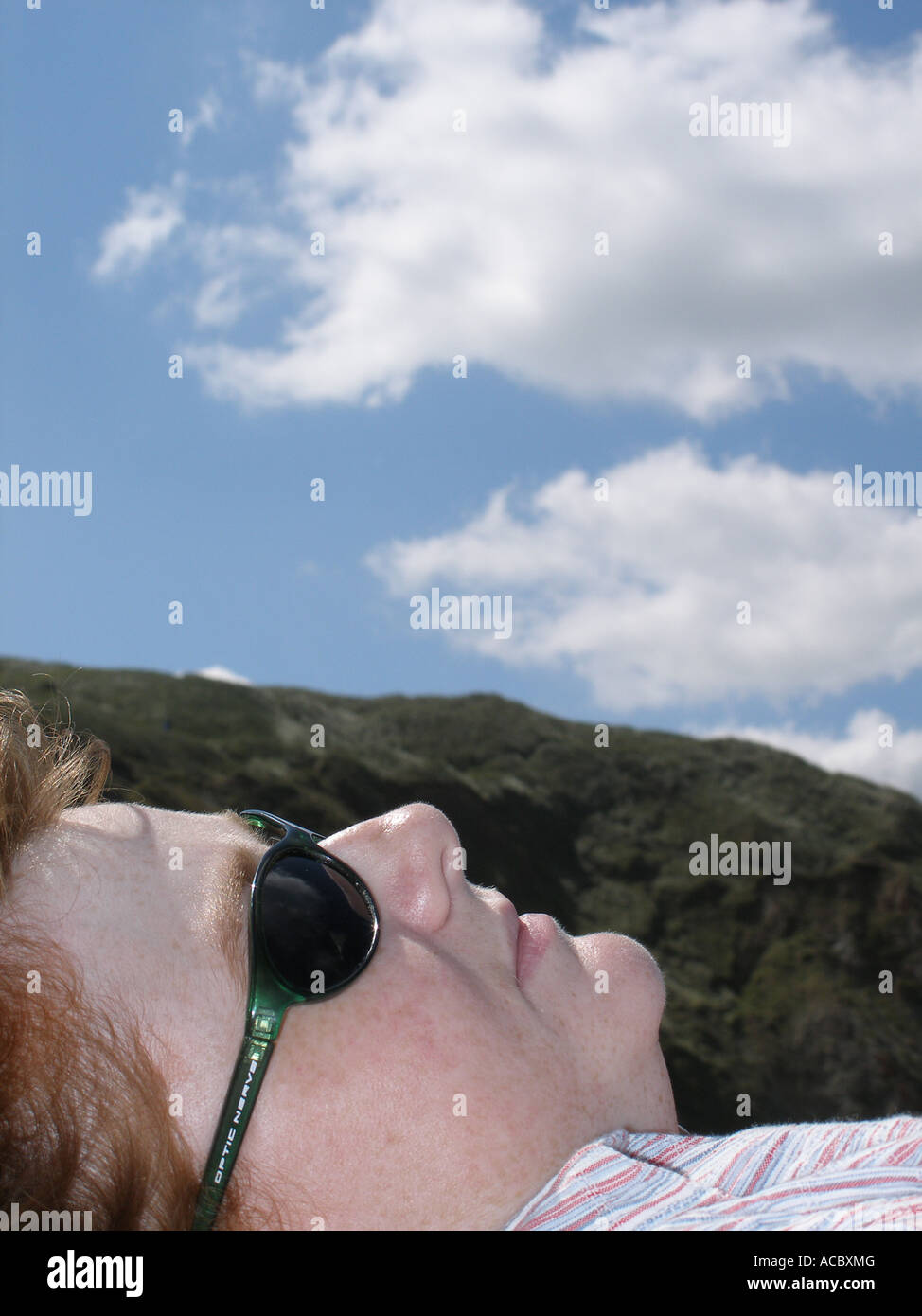 Summer sunbathing on the beach Stock Photo - Alamy