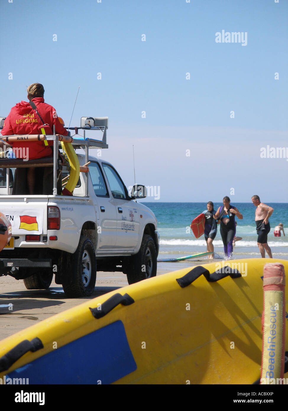 Cornwall beach in summer with lifeguards and holidaymakers Stock Photo ...