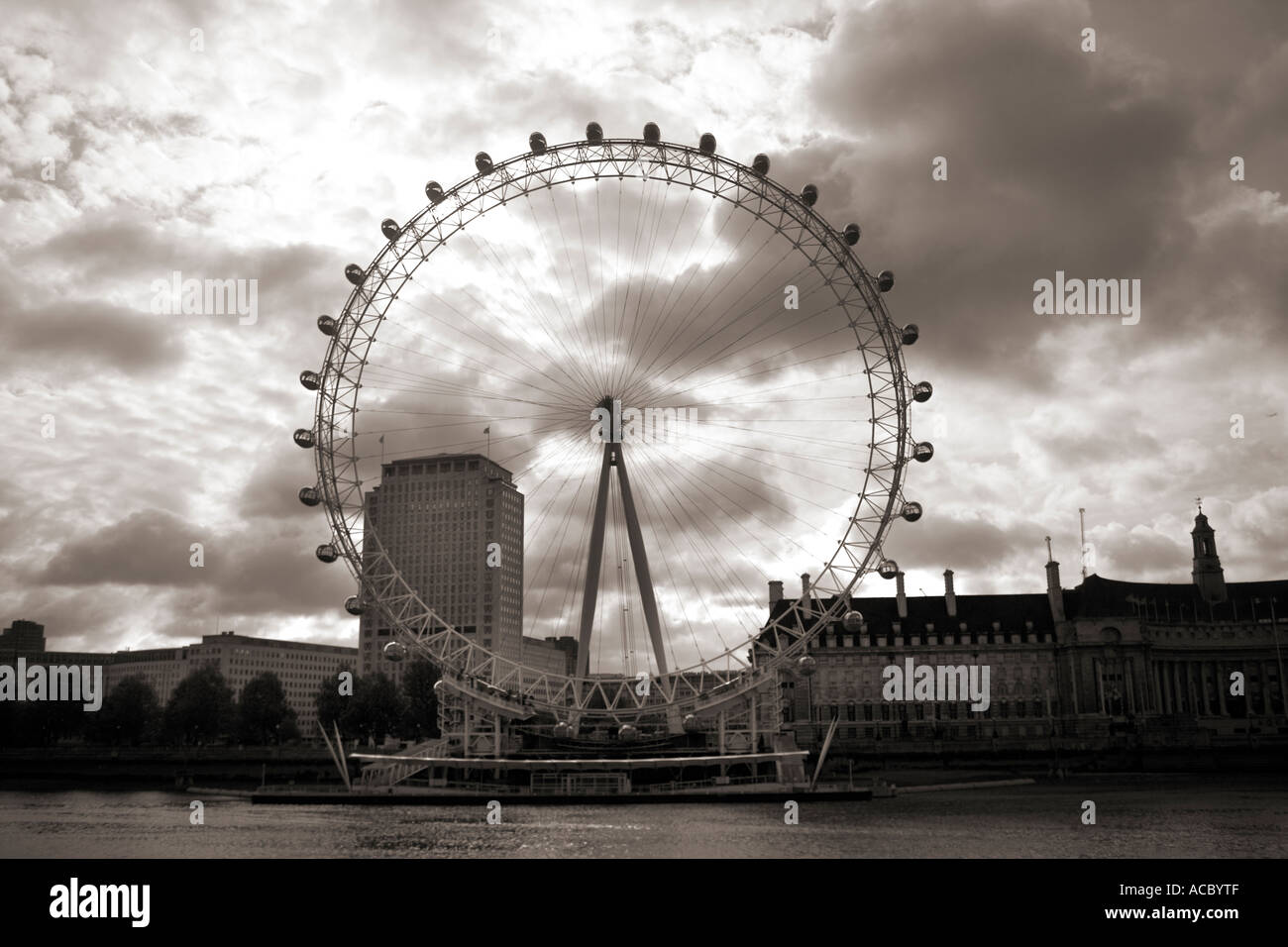 The "London Eye" ferris wheel along the "Thames River" is one of London ...
