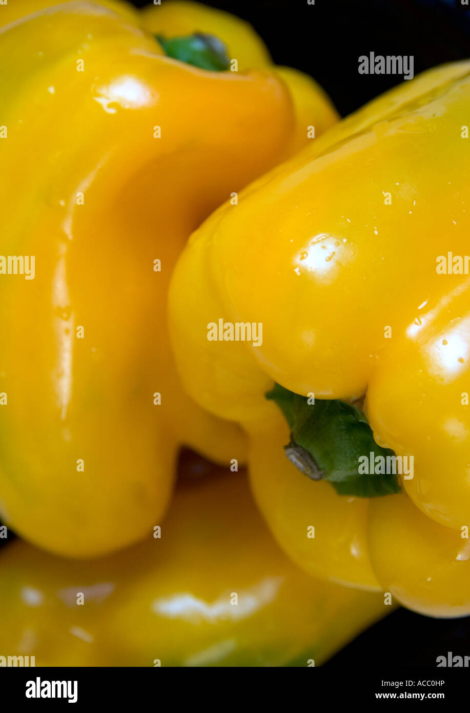 Close-up studio picture of yellow peppers Stock Photo - Alamy