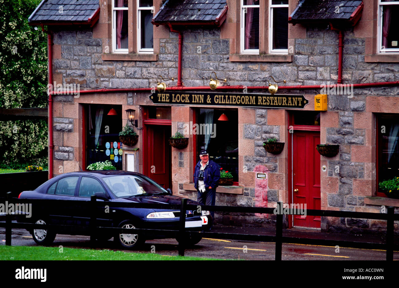 Man waiting outside the pub Stock Photo - Alamy