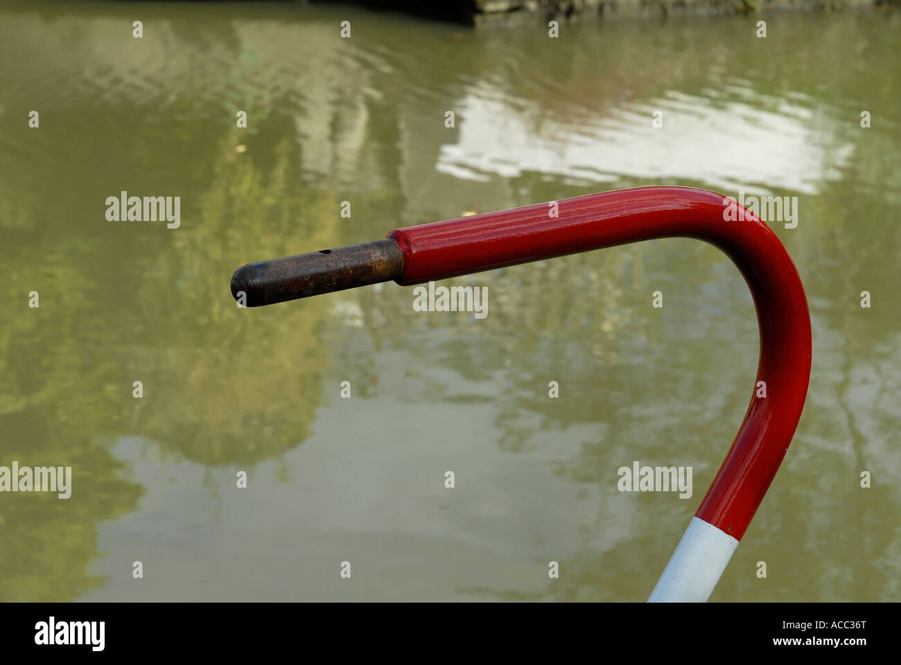 Red narrowboat tiller Stock Photo - Alamy