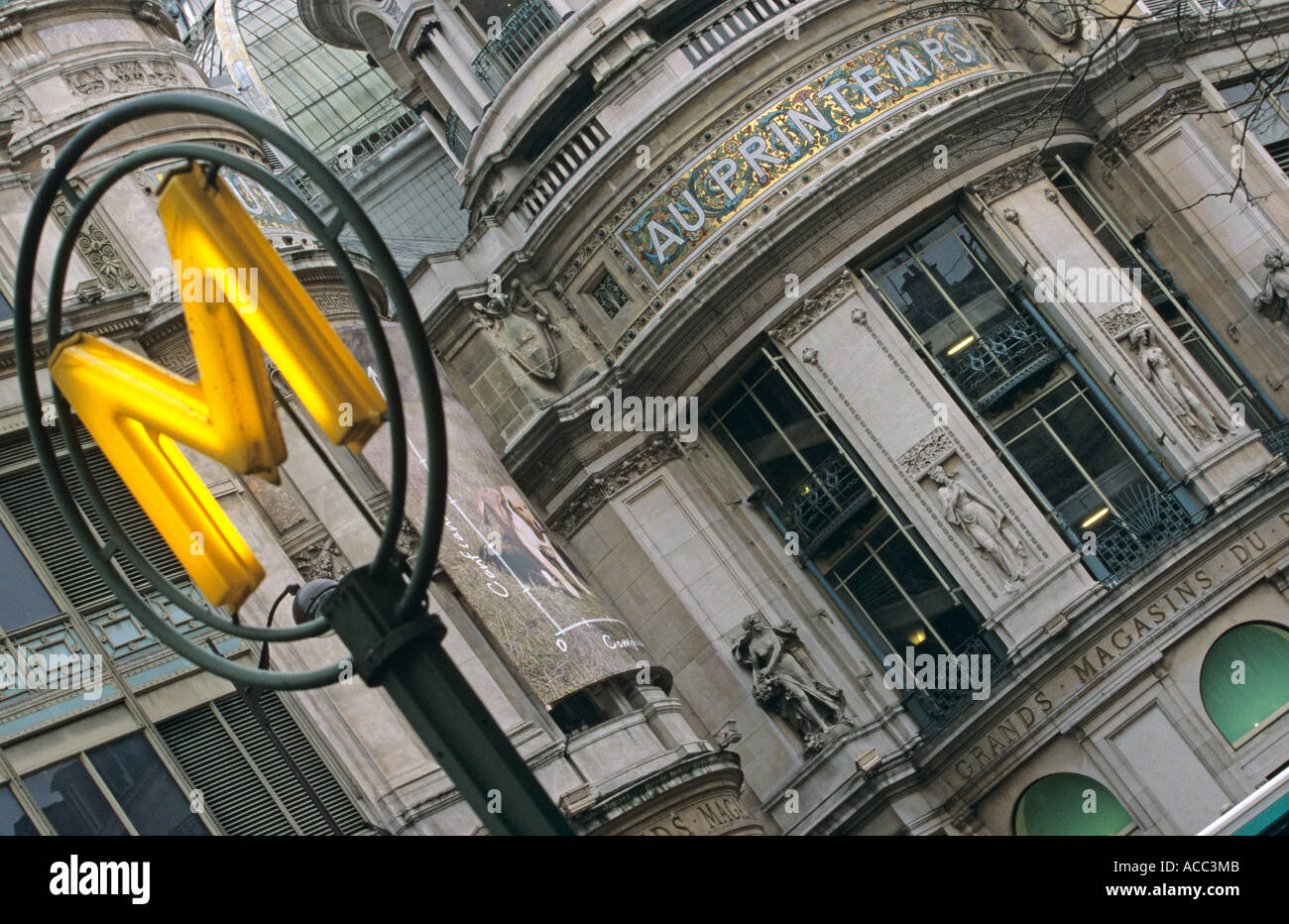 Au Printemps department store by metro station sign, Paris, France ...