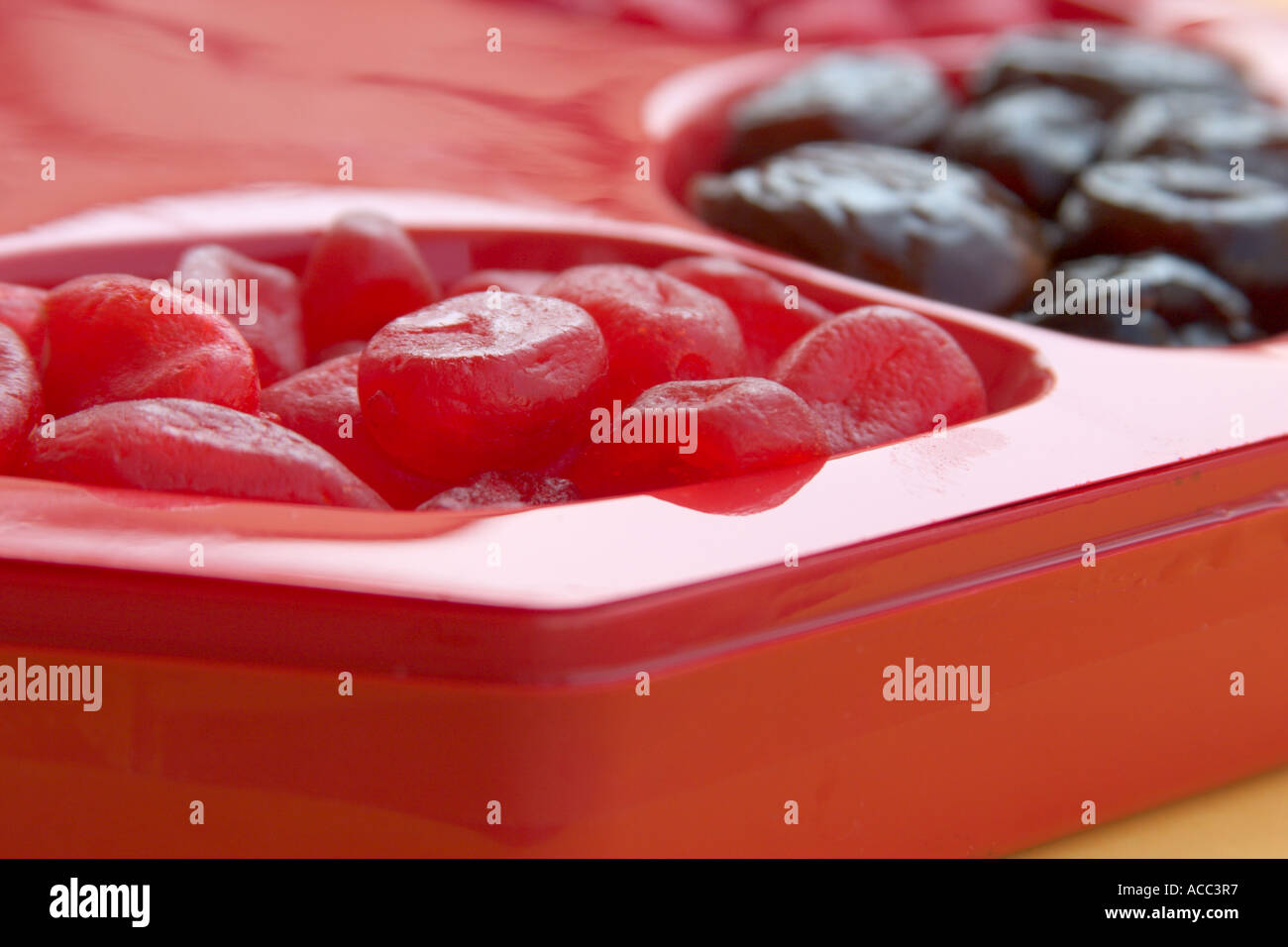 close up of a tray of preserved fruit sweets served during chinese new ...