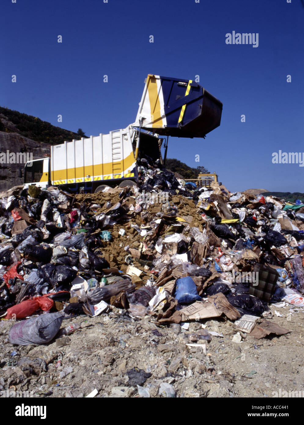 A lorry empties garbage on a rubbish tip Stock Photo - Alamy