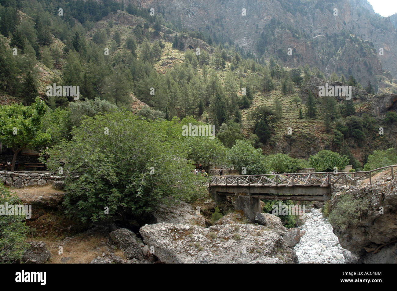 Wooden bridge over dryied riverbed leading to Samaria village in ...