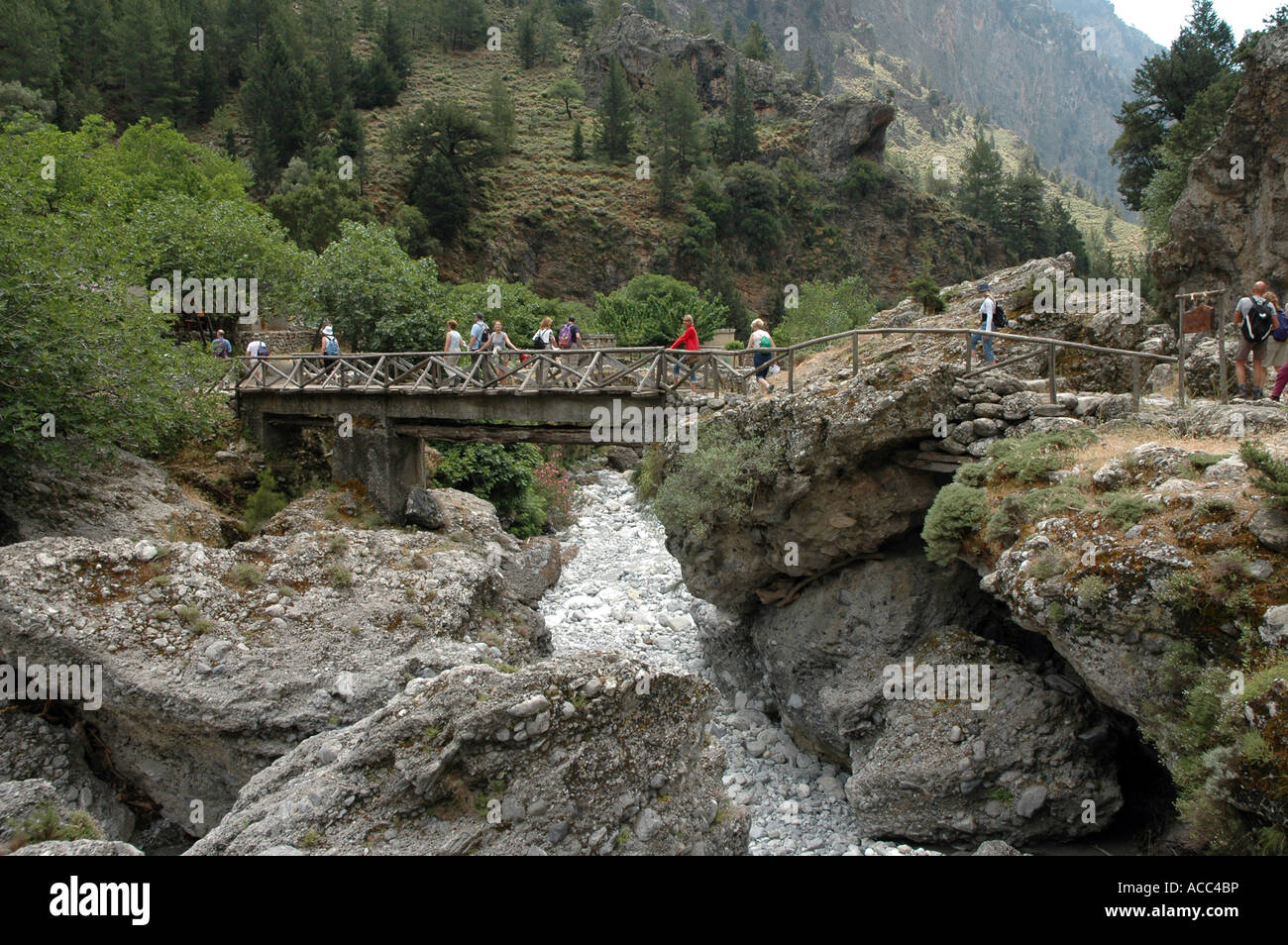 Wooden bridge over dryied riverbed leading to Samaria village in ...