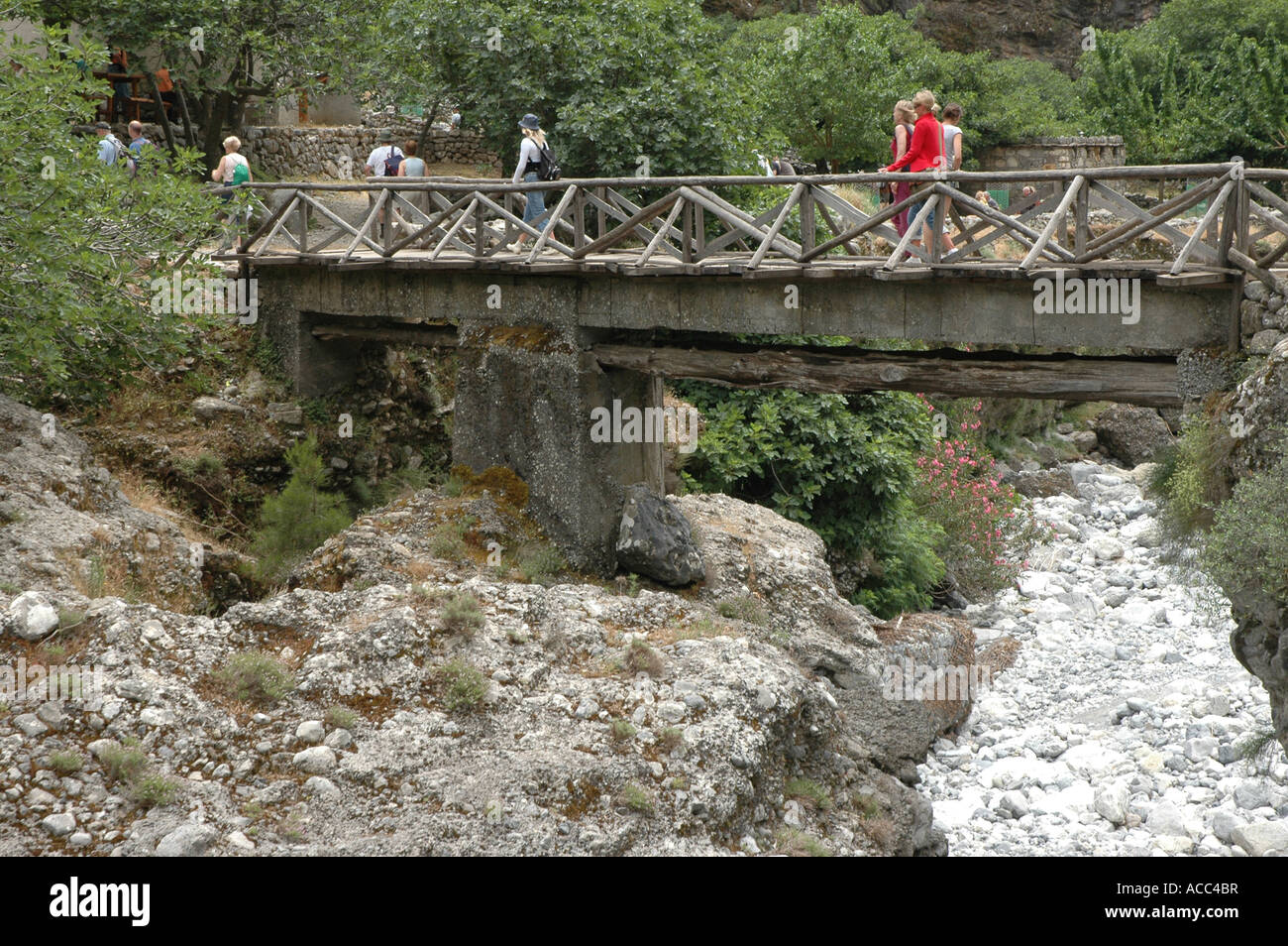 Wooden bridge over dryied riverbed leading to Samaria village in ...