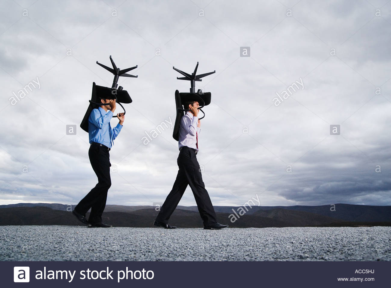 Men Carrying Chairs Stock Photos & Men Carrying Chairs Stock Images - Alamy