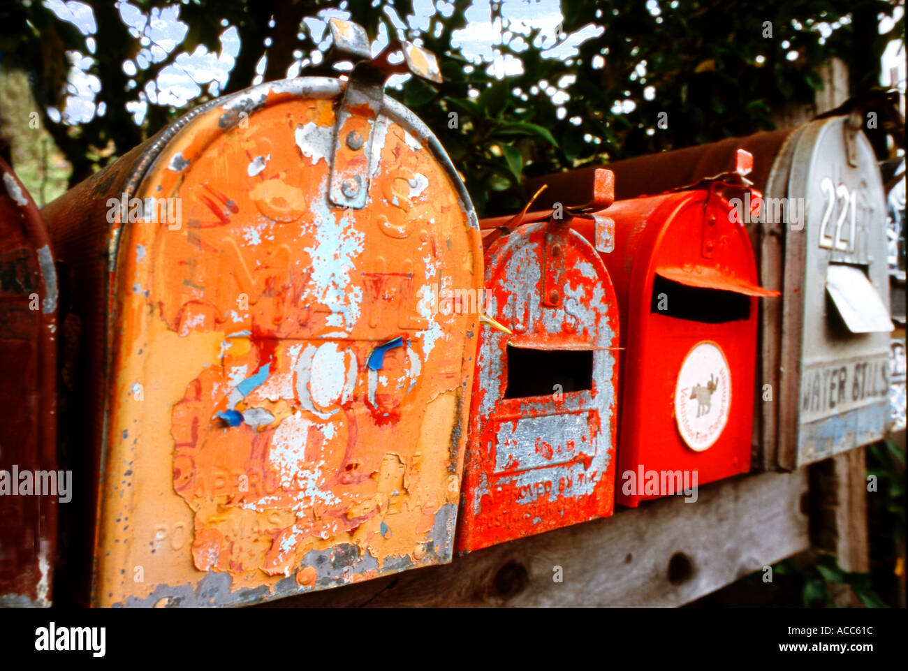 colorful country mailboxes with mail slots Stock Photo - Alamy