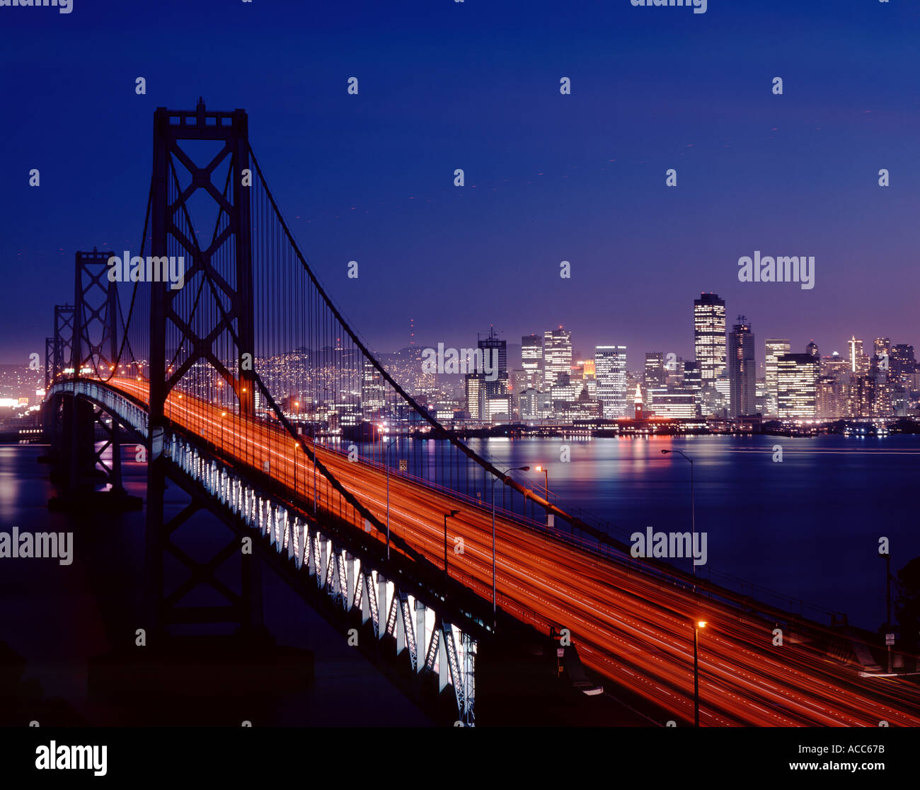 Oakland Bay Bridge with San Francisco California USA at night Stock ...