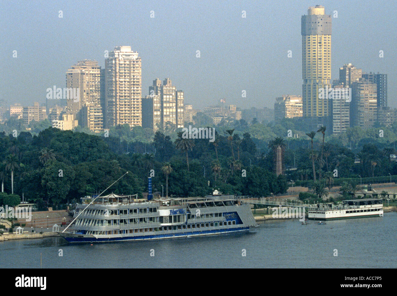 Cairo cityscape and skyline with river boats on River Nile waterfront ...