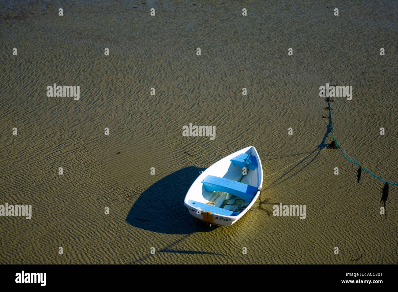 Boat moored up at La Rocque harbour Stock Photo - Alamy