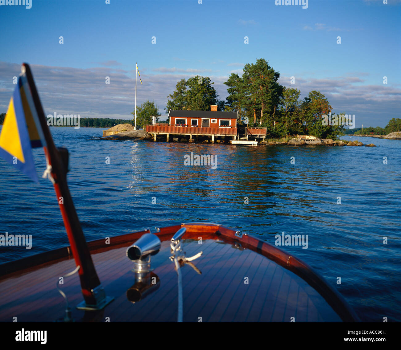 A small house on an island Stock Photo - Alamy