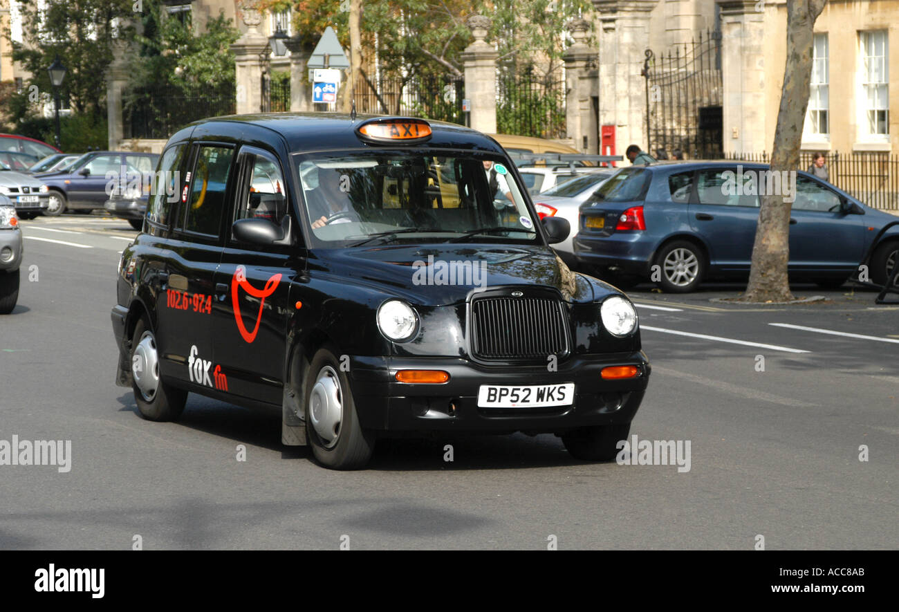 Traditional London taxi hackney cab in St Giles street Oxford England ...