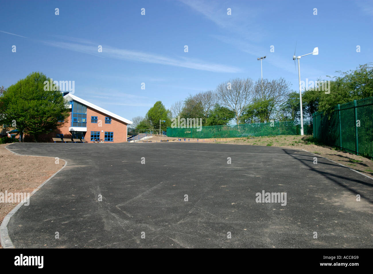 The new Mapperley Plains School the new wind turbine and the playground ...
