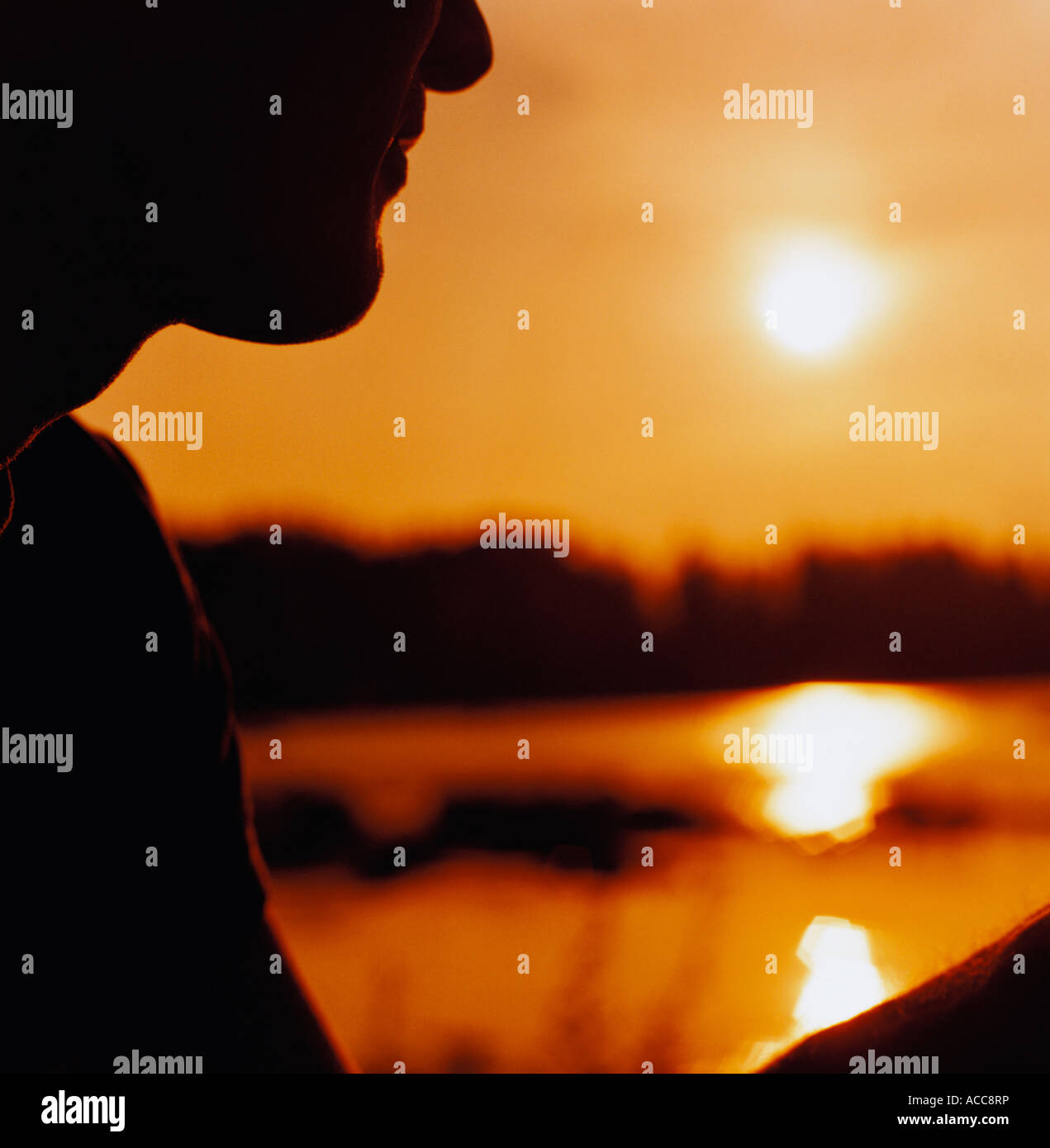 A silhouette of a man in sunset Stock Photo - Alamy