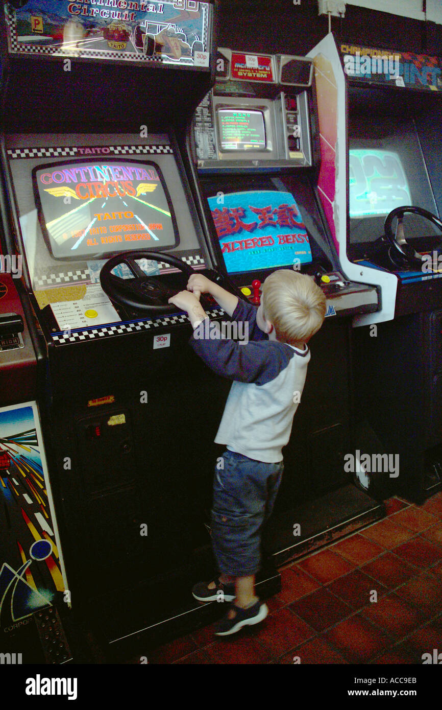 Children playing machines hi-res stock photography and images - Alamy