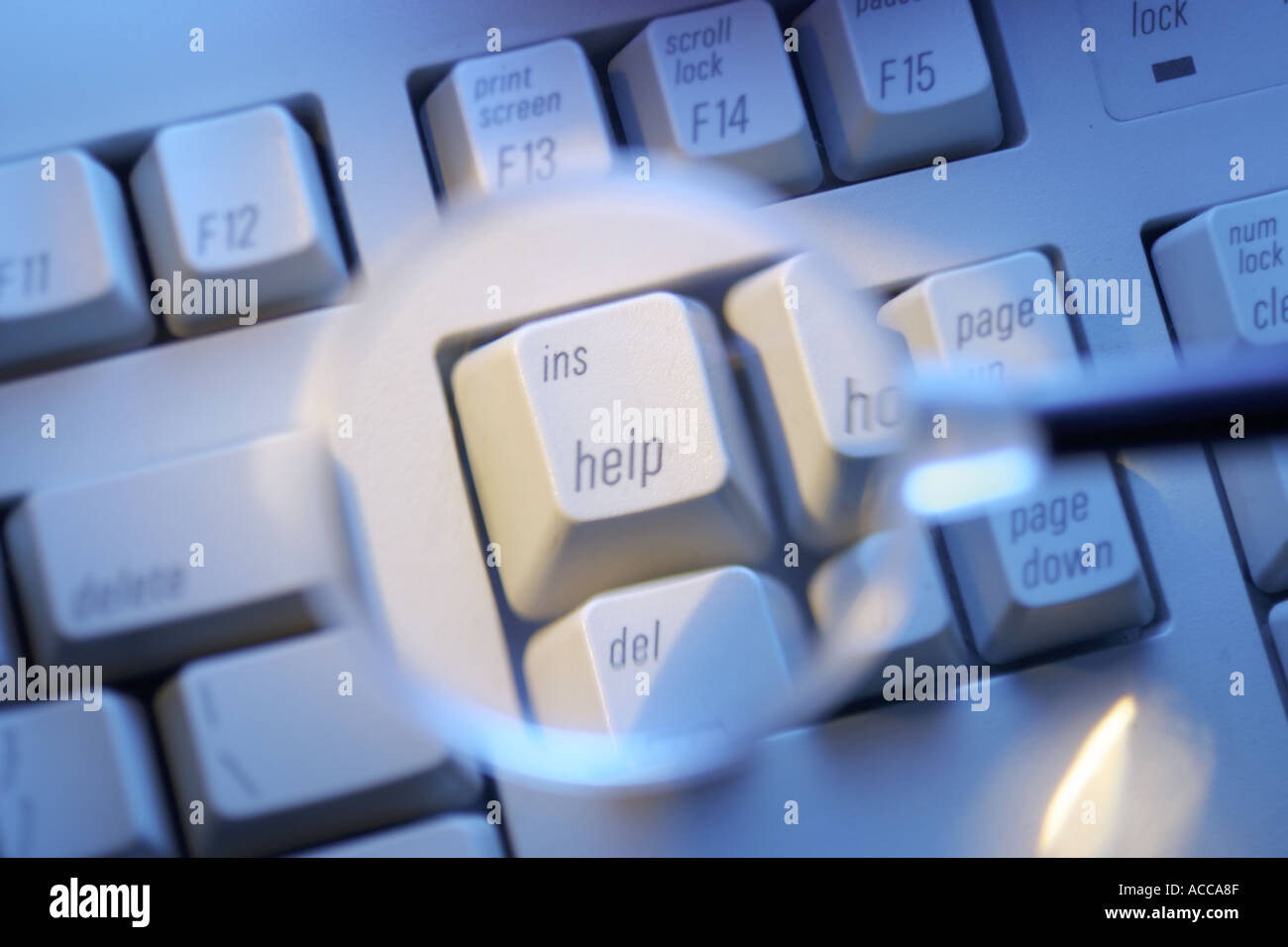 Magnifying Glass and Computer Keyboard Stock Photo - Alamy