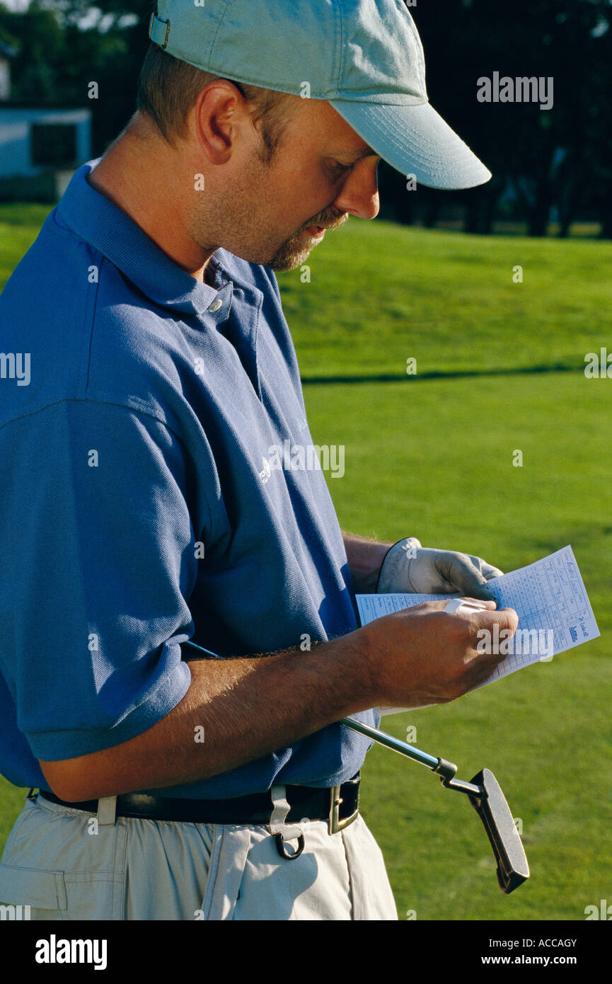 A man playing golf Stock Photo - Alamy