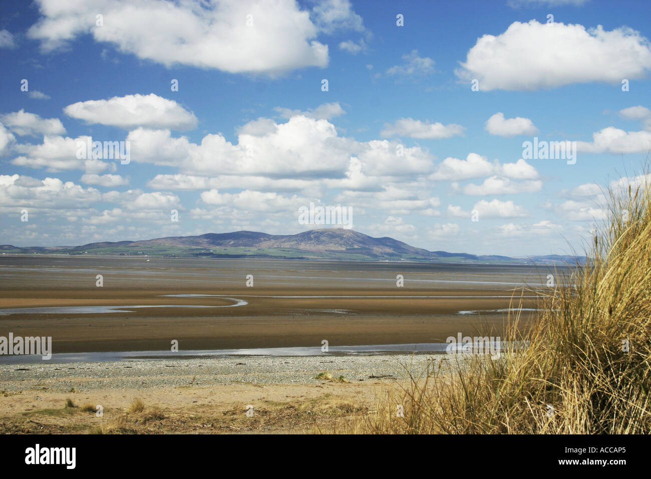 Walking the Cumbria Coastal Way, Cumbria, England, with the mountain of ...