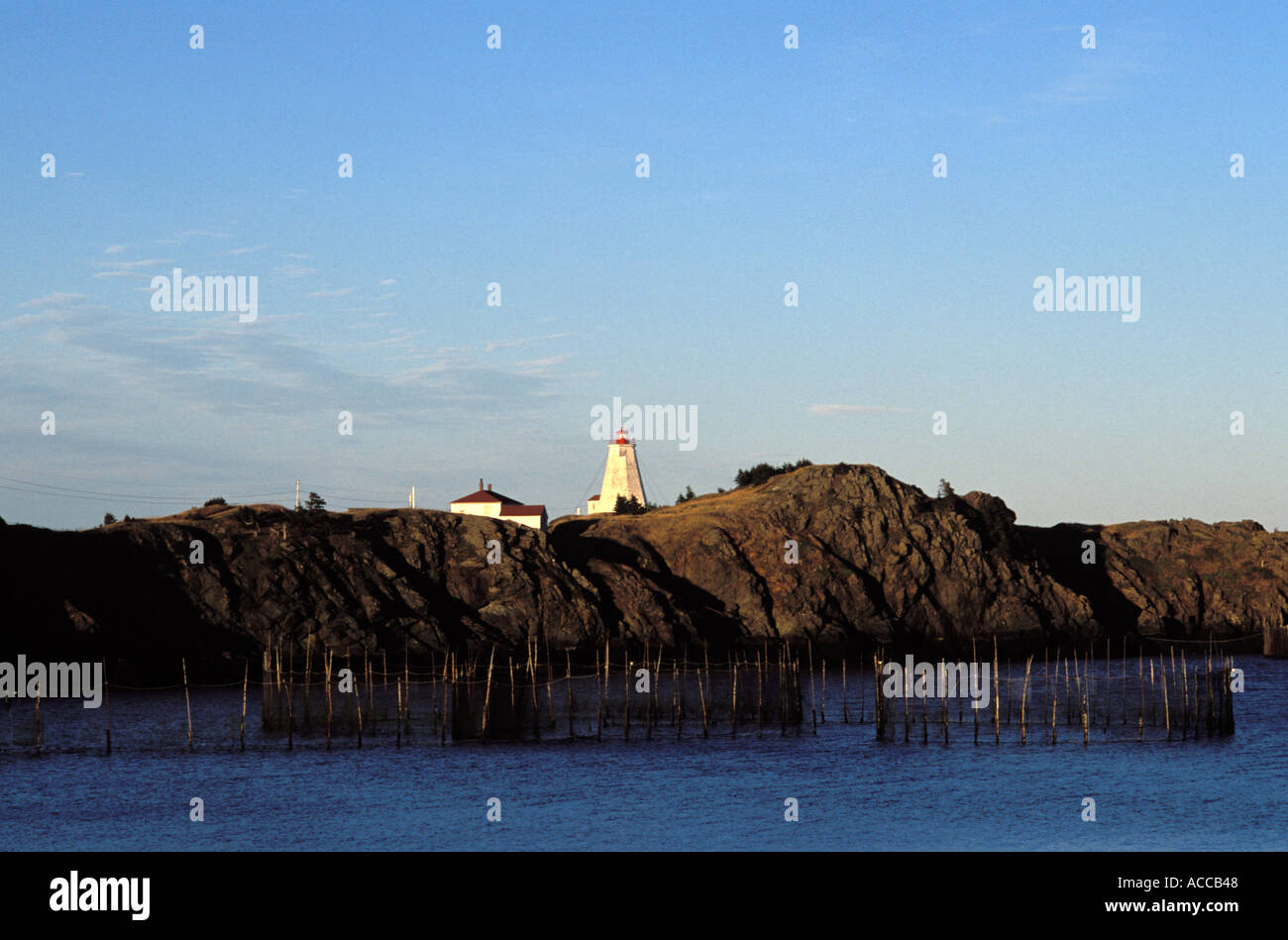 Swallowtail Lighthouse on Grand Manan Island with fishing weirs in ...