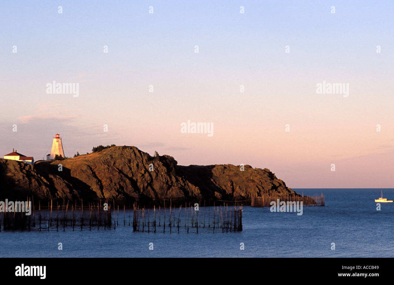 Swallowtail Lighthouse on Grand Manan Island with fishing weirs in ...