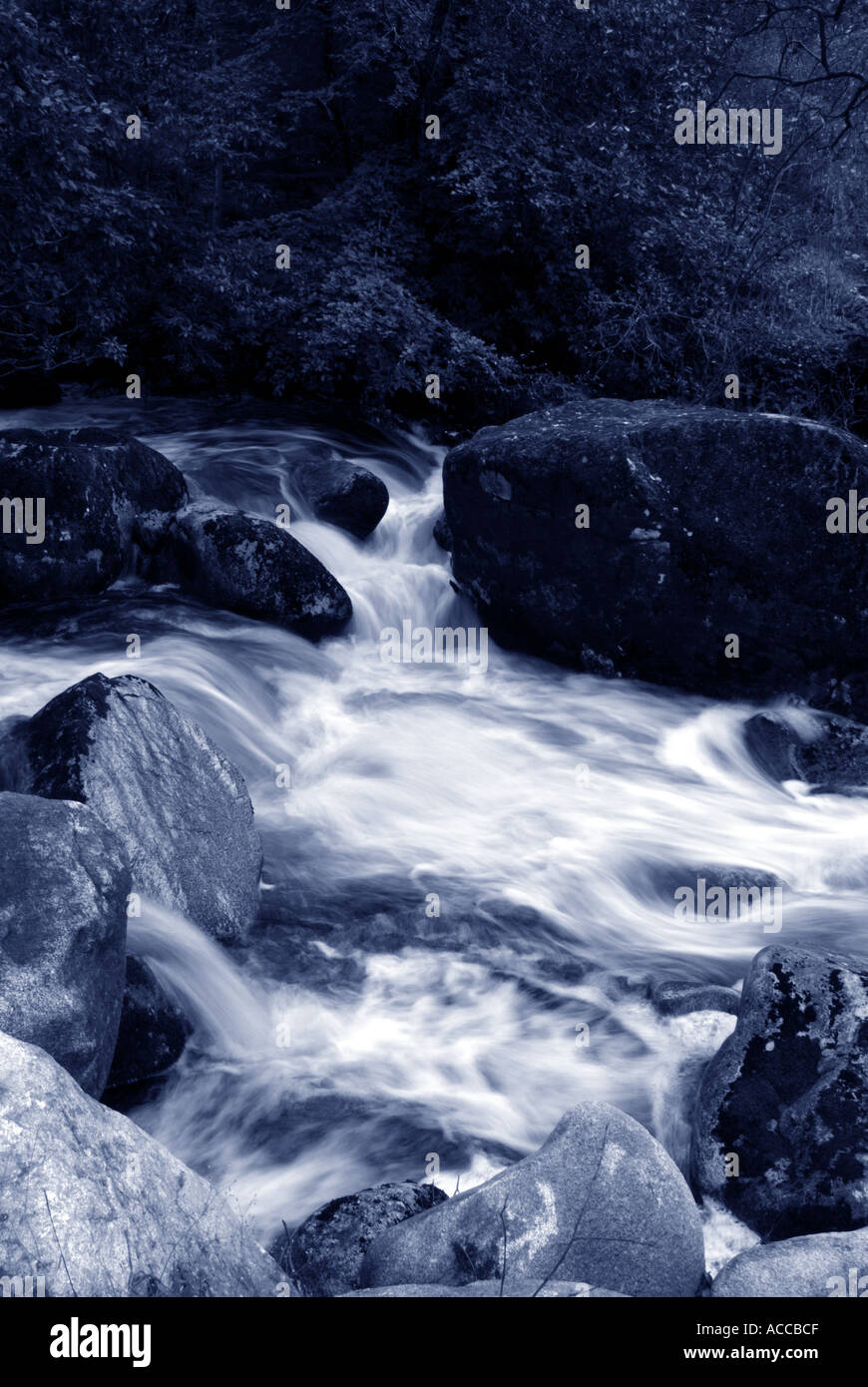 Black and white picture of water flowing over rocks Stock Photo - Alamy