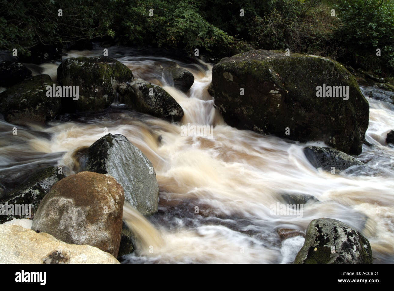 Water flowing over rocks Stock Photo - Alamy