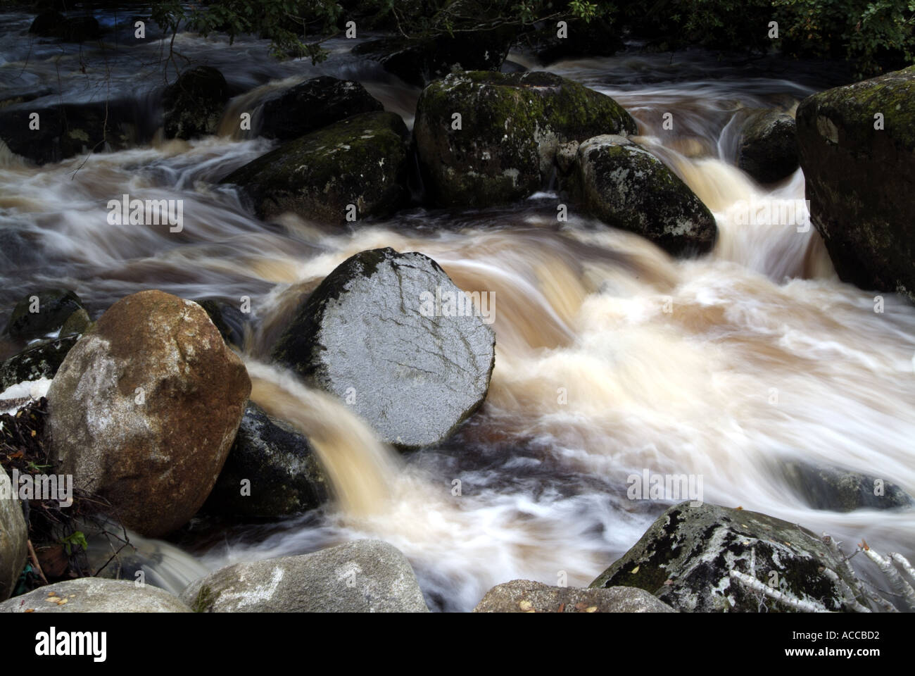 Water flowing over rocks Stock Photo - Alamy
