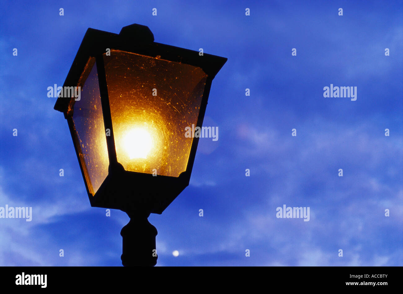 A lit lamppost Stock Photo - Alamy
