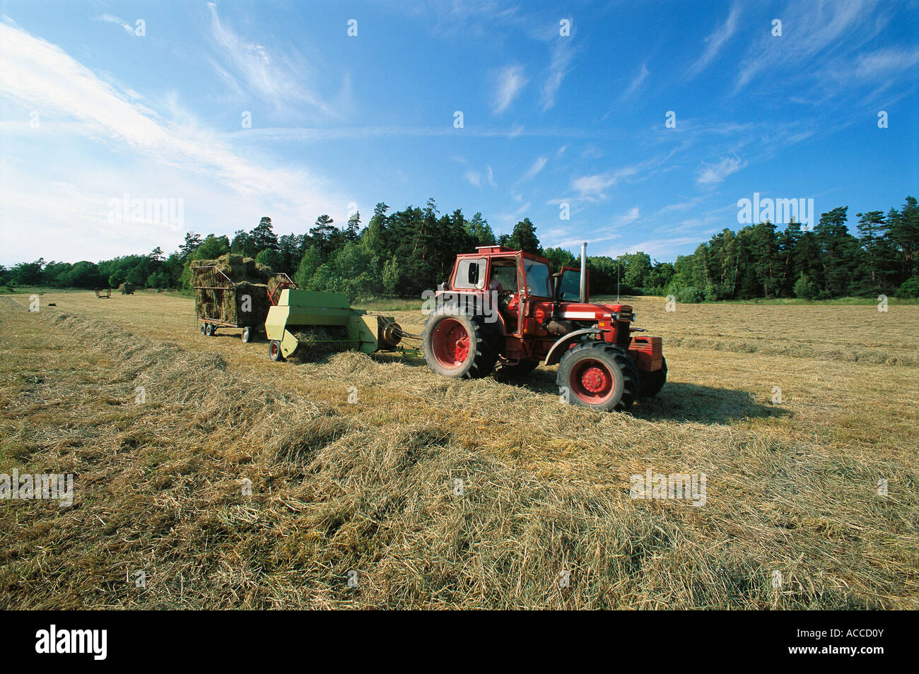 Bale hay tractor in hi-res stock photography and images - Alamy