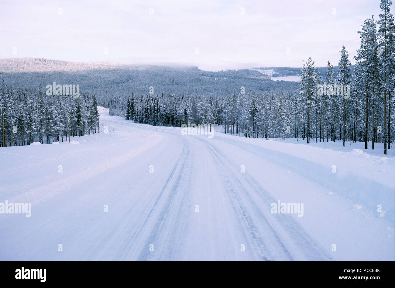 A road covered in snow Stock Photo - Alamy