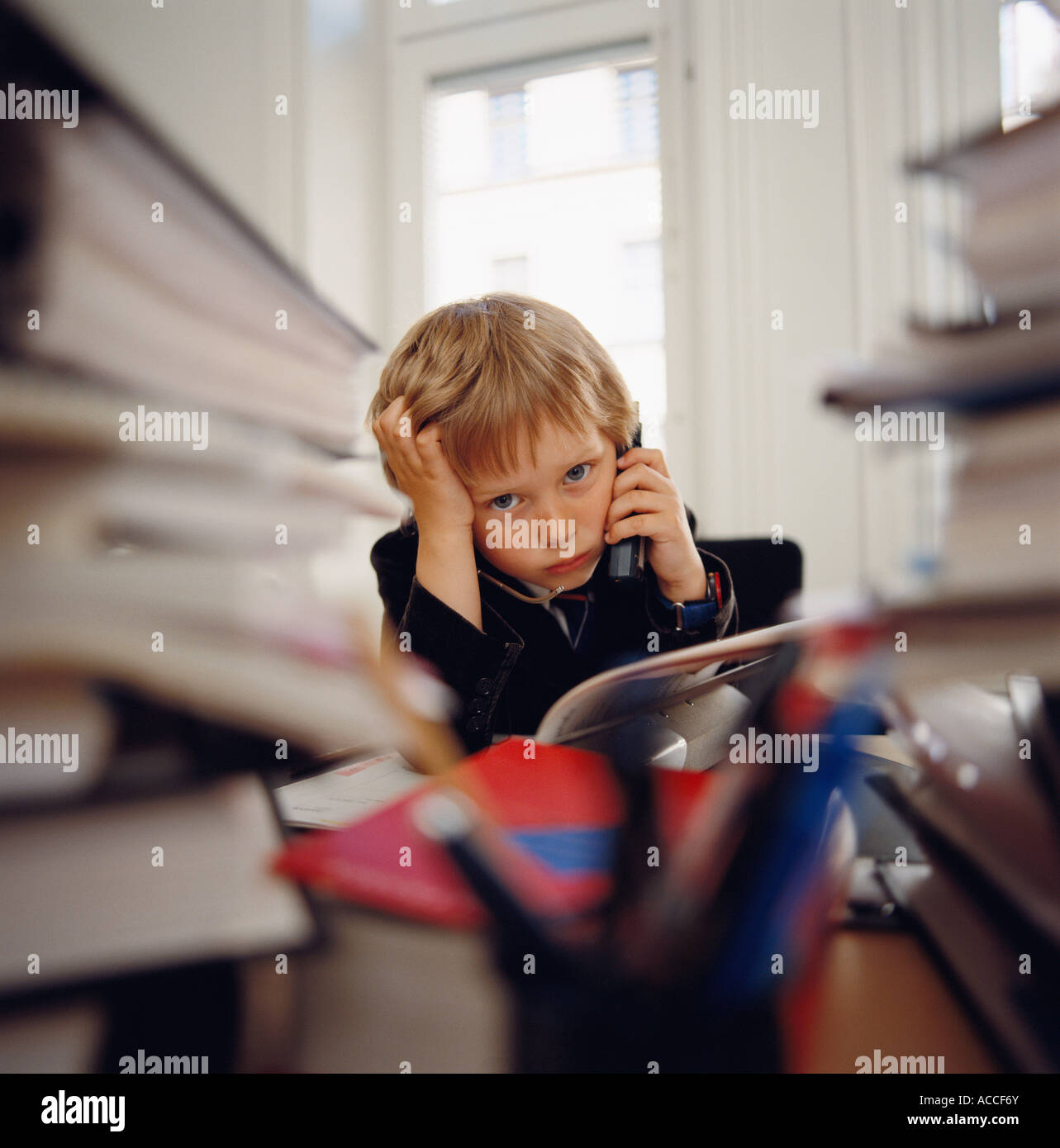 A boy talking on a phone Stock Photo - Alamy