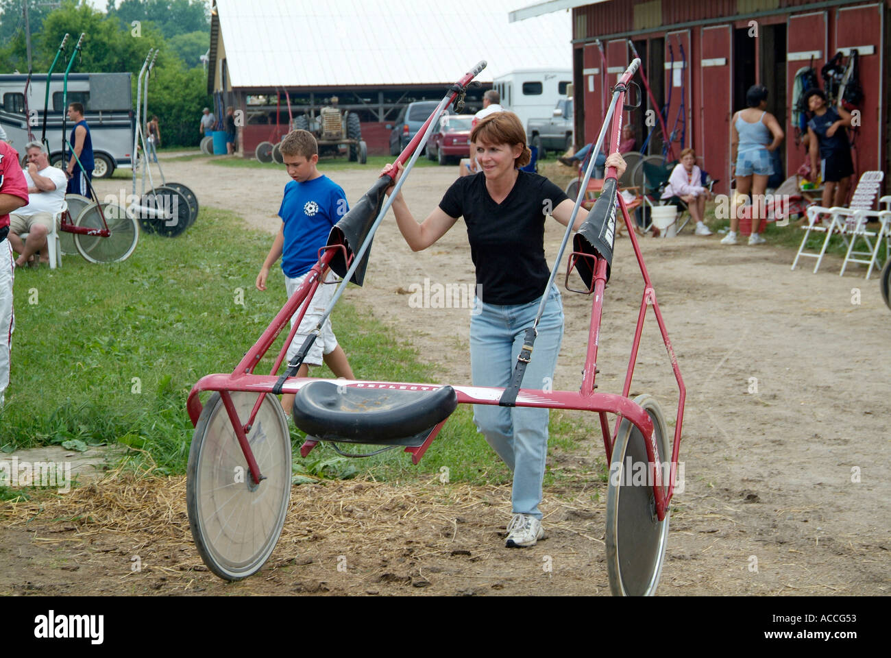 Female jockey prepares for racing event Stock Photo - Alamy