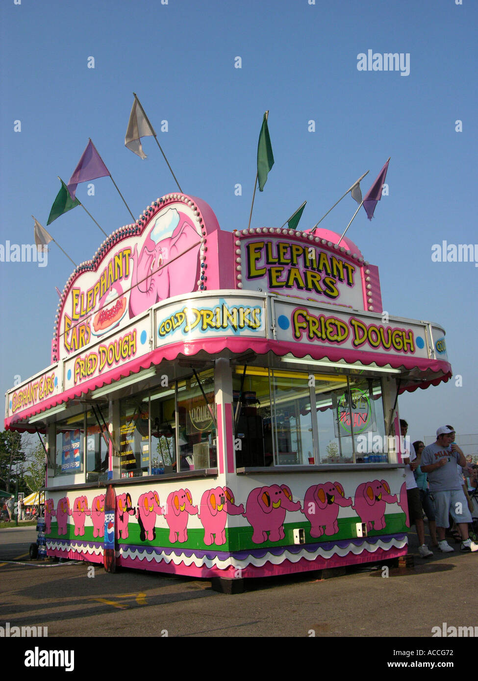 Booth selling junk food at a carnival Stock Photo - Alamy