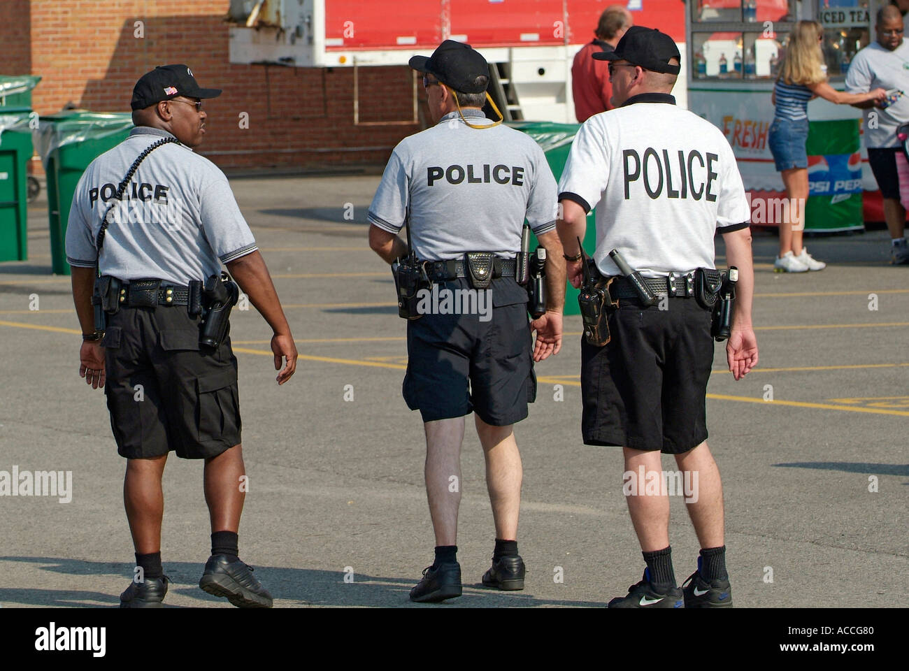 Police provide security at a carnival festival Stock Photo - Alamy